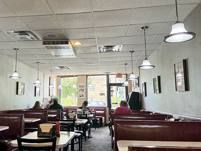 Step inside and time stands still. These red vinyl booths have witnessed first dates, family celebrations, and countless "I can't believe I ate the whole thing" moments.