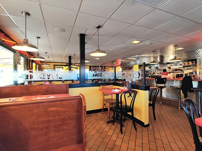The classic diner interior hits all the right notes: cozy booths, counter seating, and that unmistakable energy of a place where breakfast dreams come true.