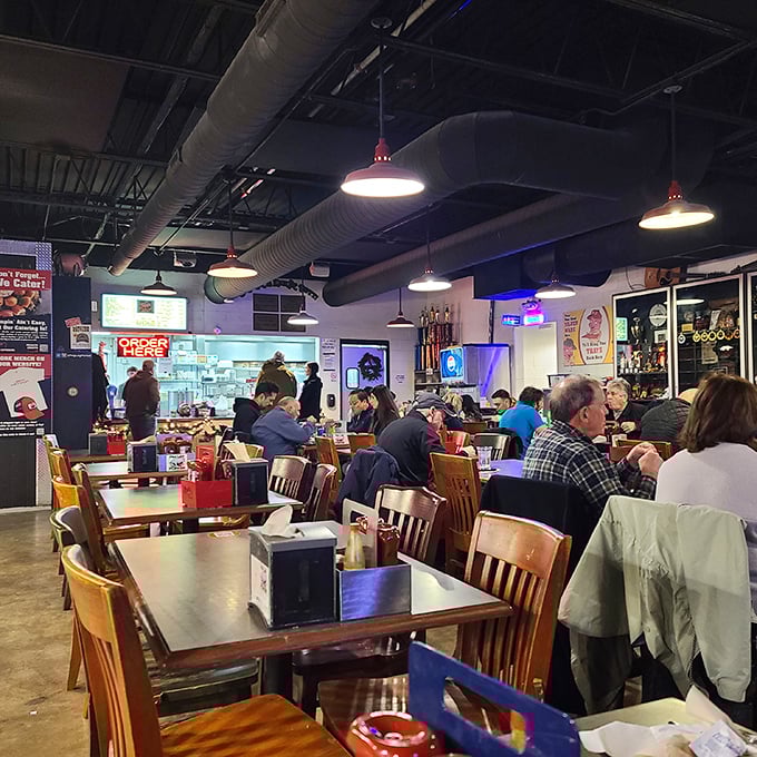 The bustling interior hums with the sacred sounds of satisfied diners—the true music of Nashville for those in the know.