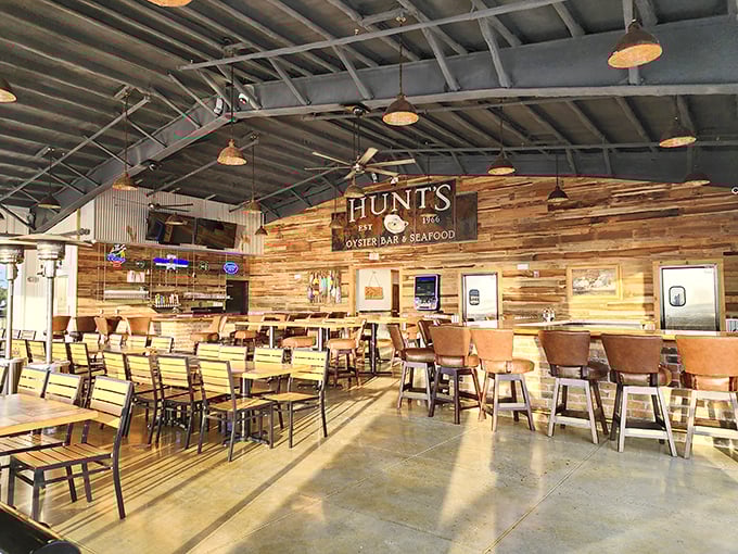 Rustic wooden walls and simple tables tell you everything—this place prioritizes what's on your plate, not what's hanging on the walls.