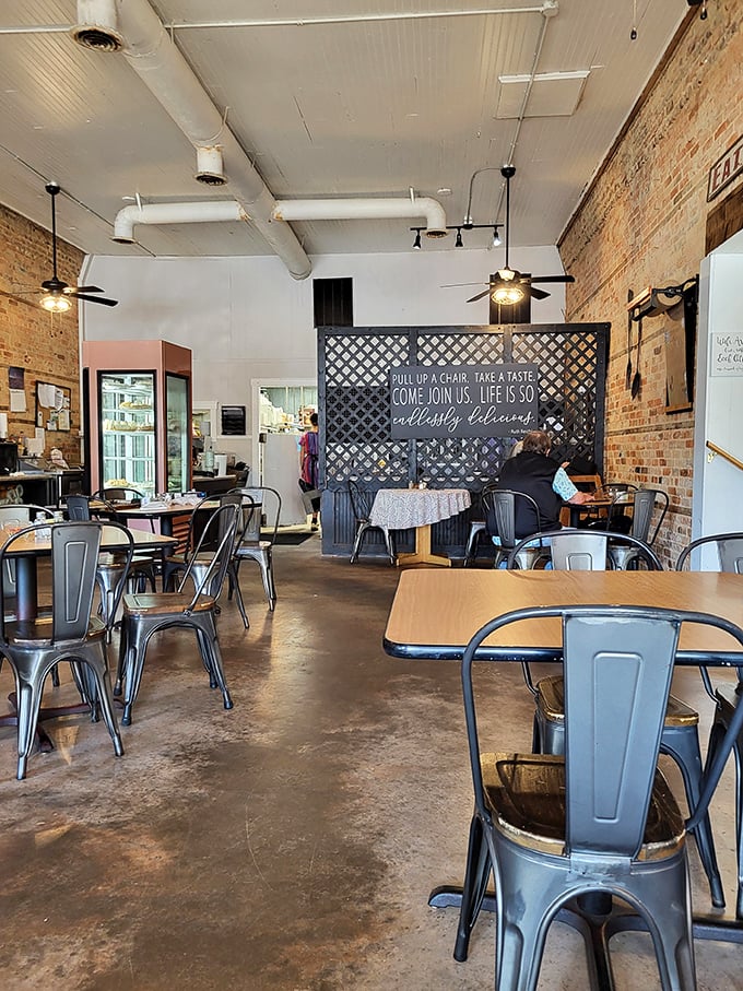 Industrial meets homey inside with exposed brick walls and metal chairs – the kind of place where comfort food gets the respect it deserves.