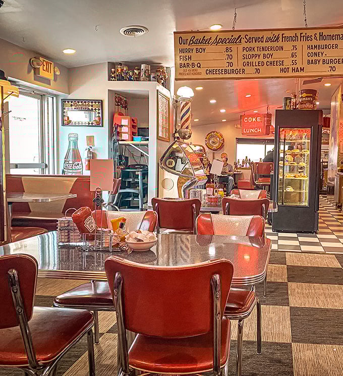 Classic Americana comes alive with cherry-red vinyl booths and chrome-edged tables. This isn't retro by design—it's authentic by choice.