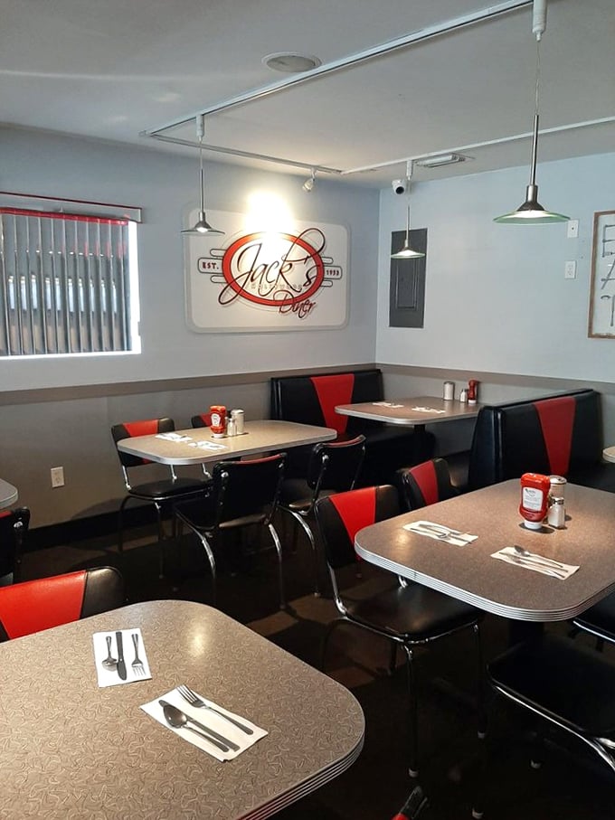 Red and black vinyl booths that transport you back to simpler times – when conversations happened face-to-face and ketchup came in glass bottles.