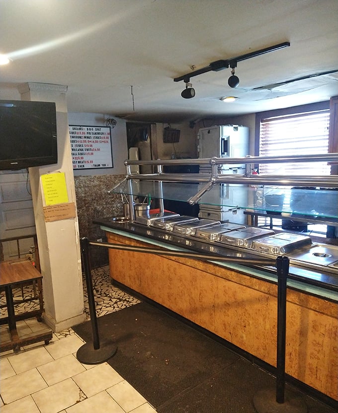No-frills serving counter that says, "We're not here for the glamour shots—we're here for serious barbecue business."