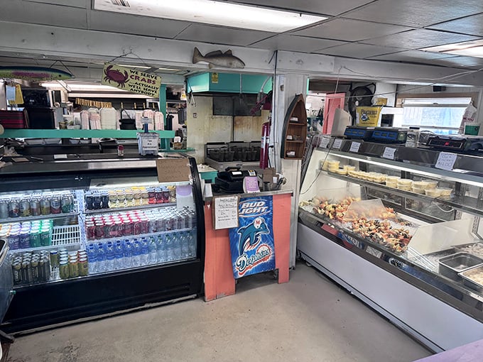 No fancy frills here—just coolers stocked with cold drinks and fresh seafood. This market section is where culinary dreams begin.