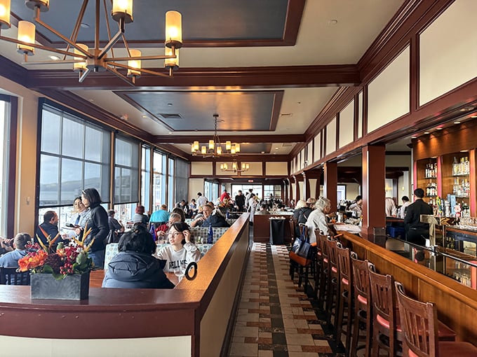 The warm wood-toned interior strikes that perfect balance—upscale enough for anniversary dinners, comfortable enough to wear your "nice" jeans.