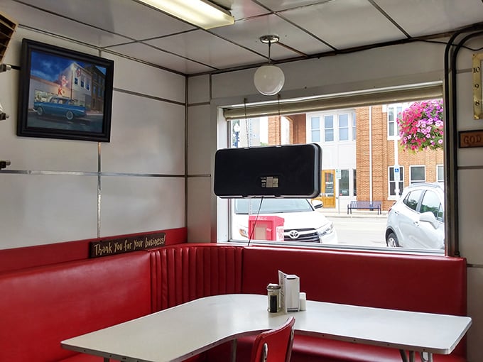 Red vinyl booths that have cradled generations of diners. The "Thank You For Your Business" isn't just signage—it's a philosophy that's kept this place thriving.