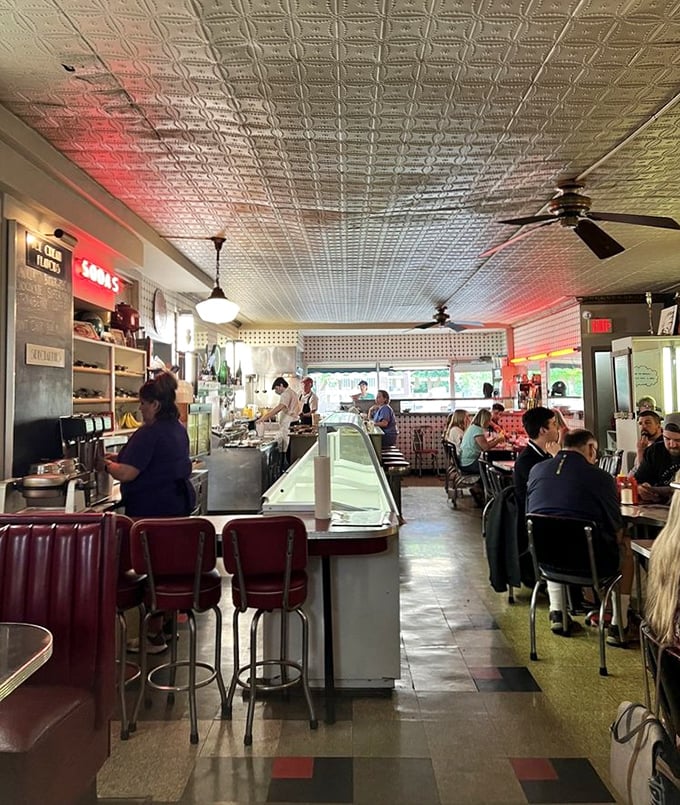 Step inside and the decades melt away—vintage counter seating, classic ceiling tiles, and the gentle hum of conversation create the soundtrack of simpler times.