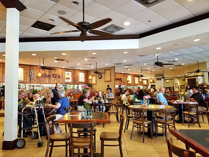 The bustling dining room hums with the symphony of satisfied diners. Notice the ceiling fans? They're not just for show—they're wafting irresistible aromas your way.