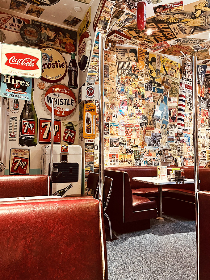 Slide into these red booths and it’s like stepping into a jukebox—vintage signs, bold colors, and stories on every wall.