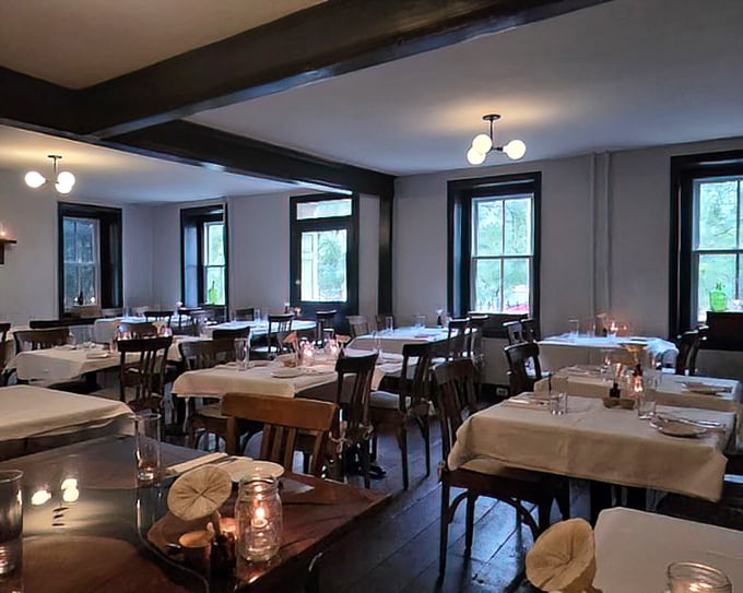 Simplicity speaks volumes in Bolete's dining room, where exposed beams, white tablecloths, and natural light create the stage for culinary theater to unfold.