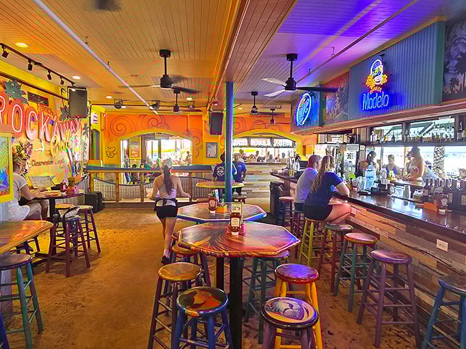 Inside Frenchy's, the vibrant colors and beach-bar energy create the perfect backdrop for that "I'm officially on vacation" moment we all crave.