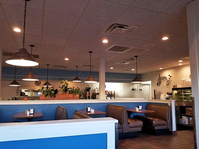 Classic diner ambiance with a side of nostalgia. Those pendant lights have witnessed more meaningful conversations than most therapists' offices.