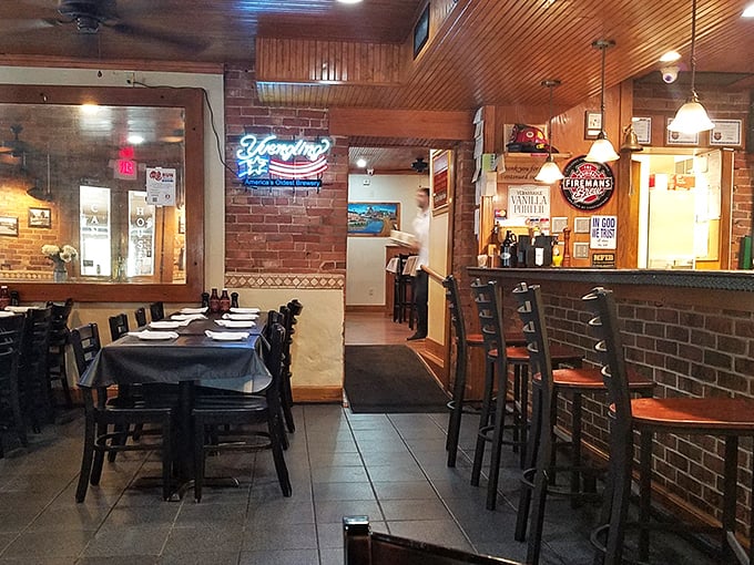 Exposed brick walls, wooden ceilings, and neon beer signs create that perfect "I've found my new favorite spot" atmosphere.