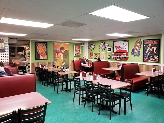 Step inside to a world where red vinyl booths meet turquoise floors, and pop culture memorabilia creates the perfect backdrop for morning magic.