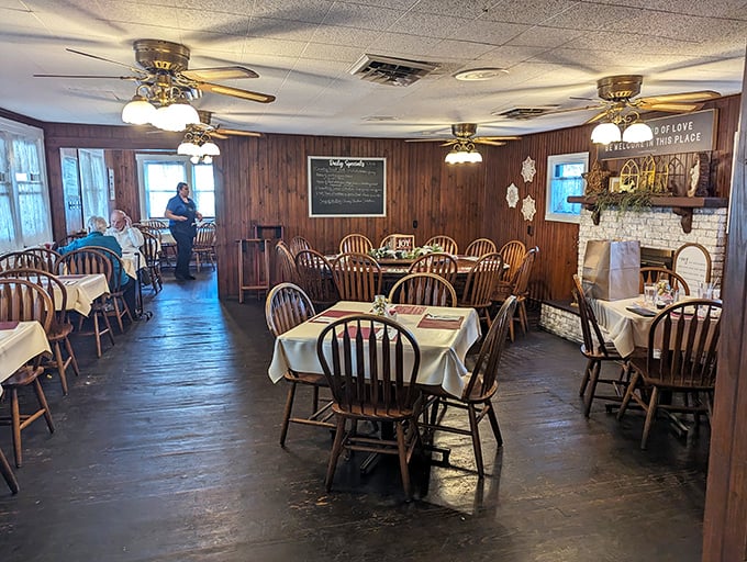 Wood-paneled walls and Windsor chairs create the perfect backdrop for comfort food conversations. This isn't trendy dining—it's timeless.