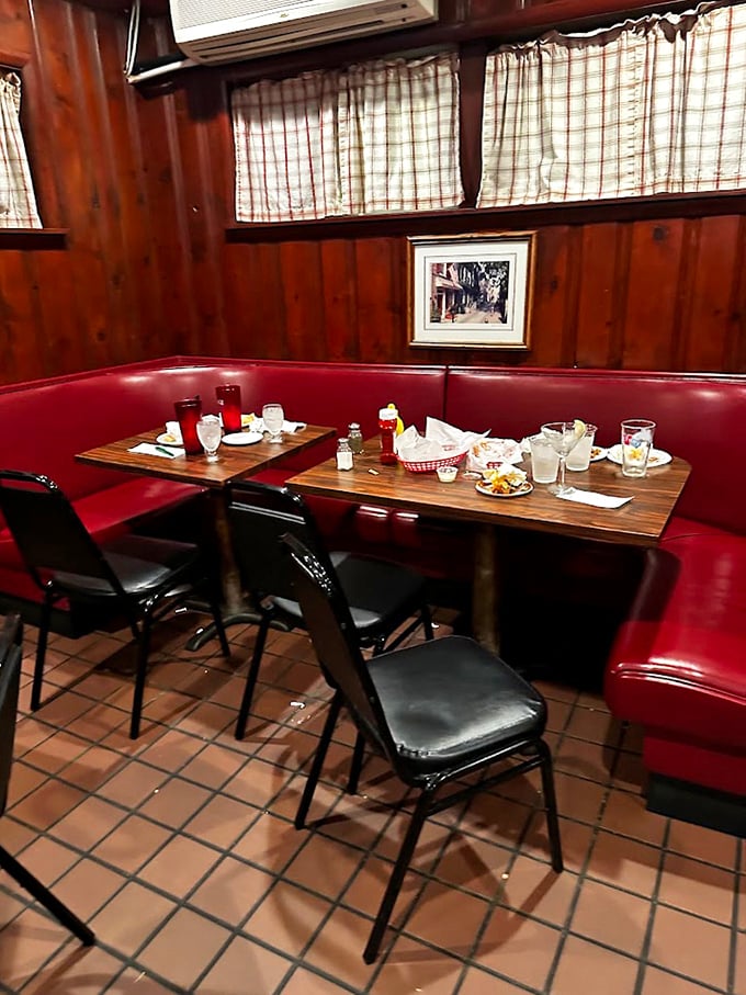 Red vinyl booths and wood-paneled walls tell stories of countless meals shared. This isn't Instagram-bait décor—it's the real deal of Pennsylvania tavern comfort.