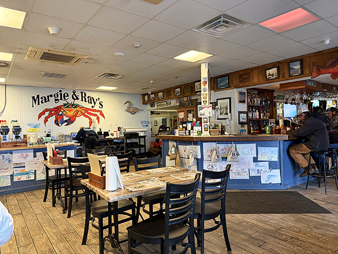 The heart of crab country – where mounted fish on paneled walls and that iconic red crab logo tell you you're in the right place for Chesapeake Bay's finest.