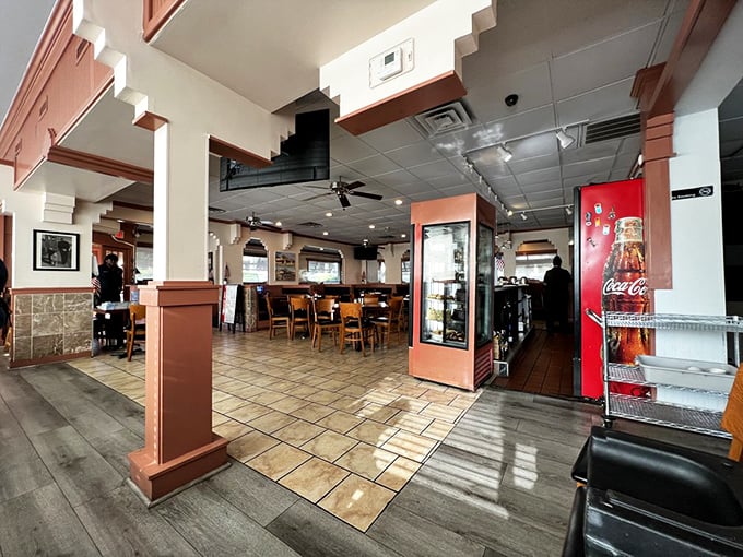 Classic diner charm meets modern comfort inside, where the promise of good food and better conversation hangs in the air like the aroma of fresh coffee.