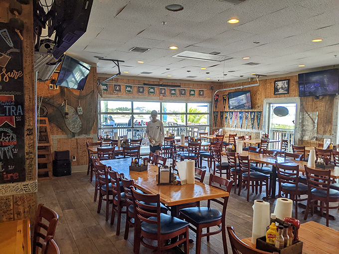 Inside, wooden tables and coastal views create the perfect backdrop for seafood feasts. Like a maritime museum where the exhibits are edible.