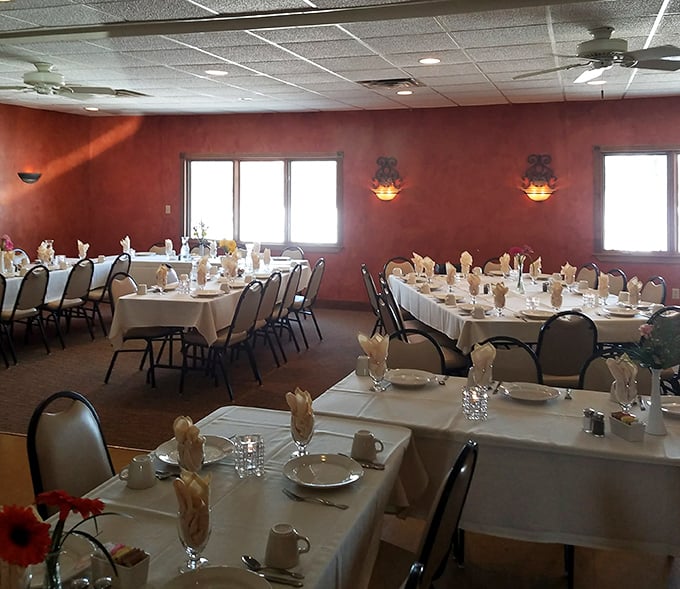 White tablecloths and warm terra cotta walls create that perfect "fancy but not fancy-fancy" atmosphere where both celebrations and Tuesday dinners feel right at home.