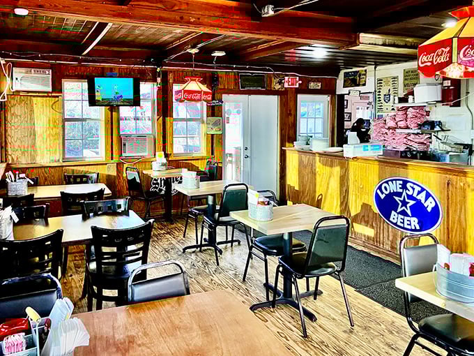 Inside, wood-paneled walls and simple furnishings create the perfect stage where the real stars—those legendary burgers—can shine without distraction.