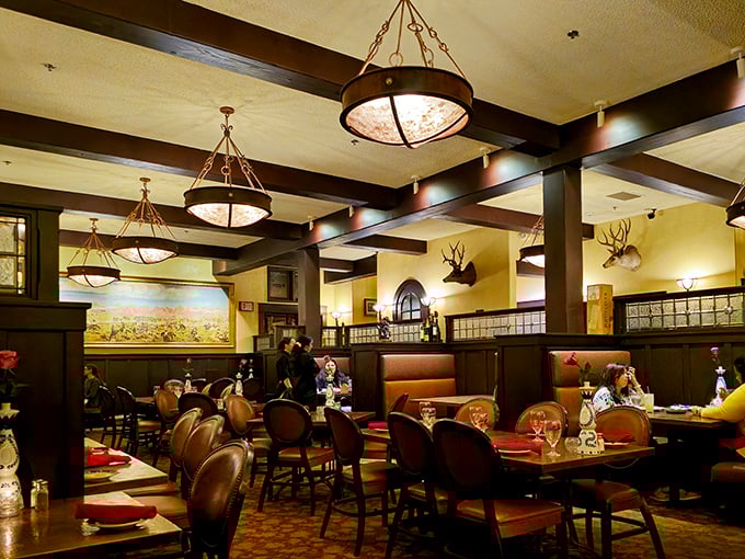 Where cowboy culture meets culinary craft. The warm glow of pendant lights and mounted trophies create the perfect backdrop for meat-induced happiness.