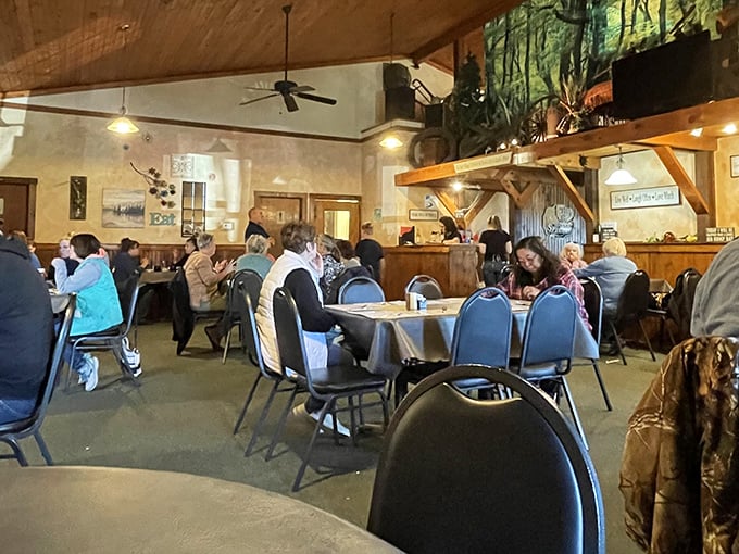Inside this cozy dining room, wooden beams and warm lighting create the perfect atmosphere for memorable meals.