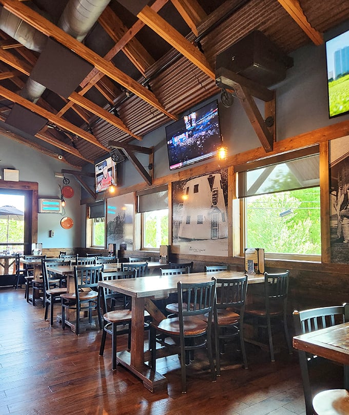 Rustic wooden beams frame the dining experience, creating that perfect "fancy cabin" vibe where comfort meets class without an ounce of pretension.