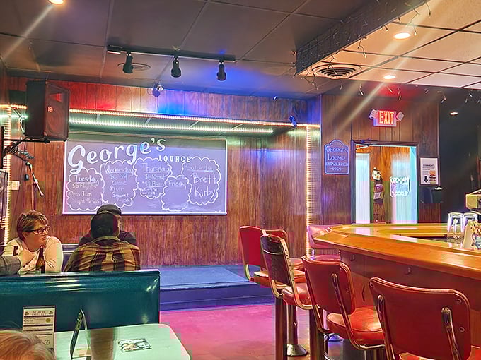 Classic red vinyl barstools and wood paneling create that perfect "I've been coming here for decades" vibe, even on your first visit.