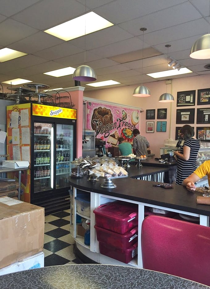 Pink walls, checkerboard floors, and a display case that might as well have a sign saying "Resistance Is Futile." Dessert heaven found!