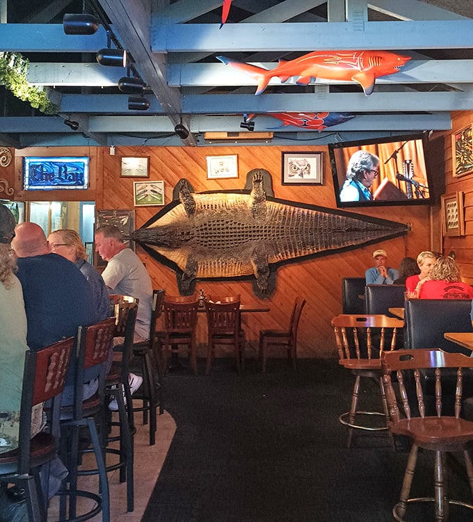 Where fishing trophies become interior design. That massive mounted fish isn't just decoration—it's a conversation starter that's witnessed countless "you should have seen what I ordered" stories.