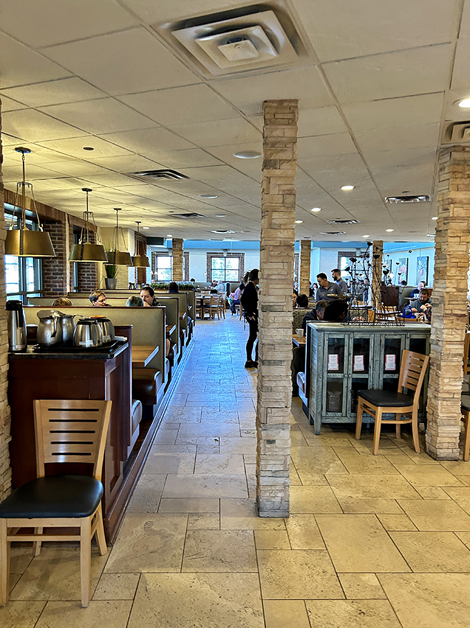 Stone columns and cozy booths create that perfect "treat yourself" vibe – fancy enough for a special occasion, casual enough for your weekend sweatpants.