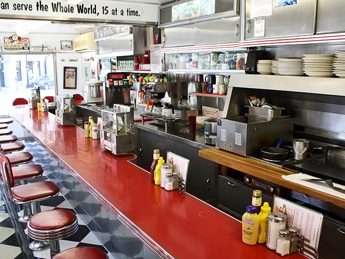 Where counter culture meets culinary comfort. The gleaming chrome and vibrant red countertops transport you to a time when conversations happened face-to-face.