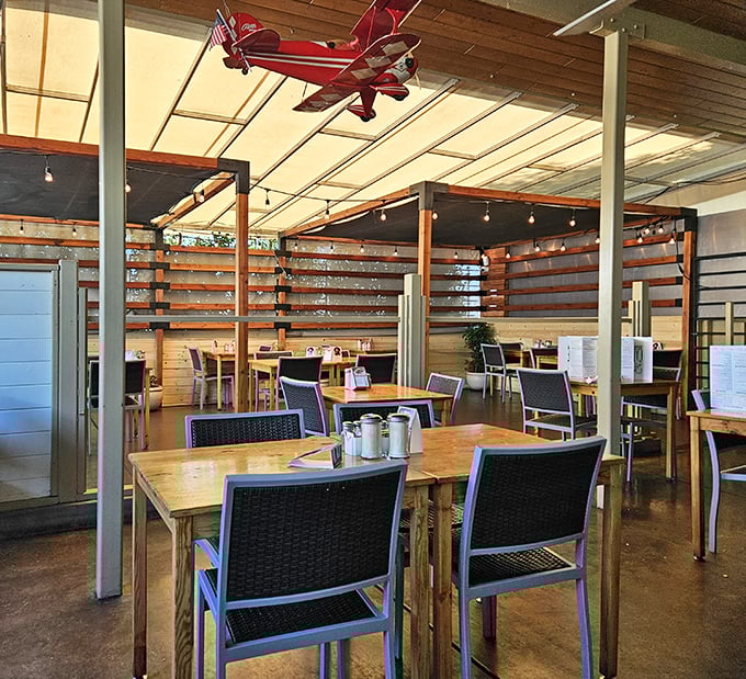 Modern comfort meets classic diner charm in this thoughtfully designed space where every seat promises satisfaction.