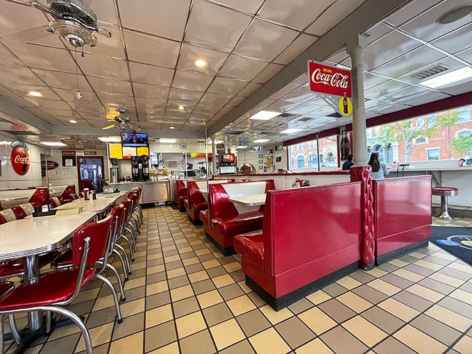 Classic red vinyl booths and chrome accents transport diners to simpler times, when conversations flowed as freely as the coffee and nobody was staring at their phones.