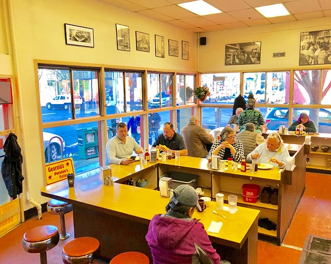 Yellow walls adorned with Portland's past, wooden tables filled with regulars—this is where breakfast dreams come true, not Instagram opportunities.