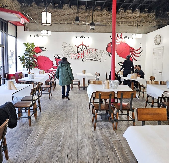 Simple wooden tables and that eye-catching crab mural let you know immediately – you're here for the food, not fancy frills.