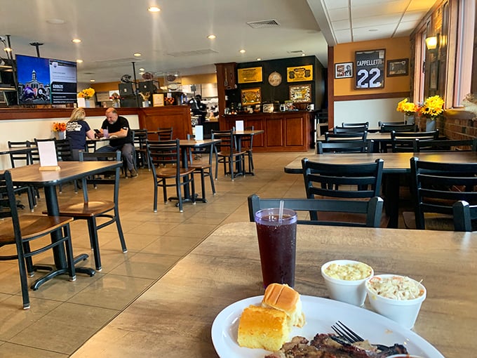 Simple tables, Penn State memorabilia, and an atmosphere that says "focus on the food." This isn't a place for pretension—it's a temple of smoke.