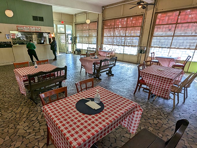 Classic red-checkered tablecloths and no-nonsense seating tell you everything you need to know—this place prioritizes substance over style, just as the barbecue gods intended.