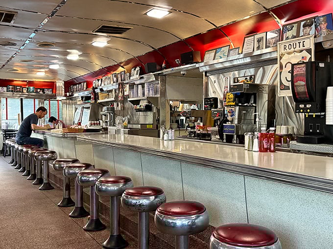 The counter beckons with its row of burgundy stools, where strangers become friends over coffee and pie. This isn't manufactured nostalgia – it's the real deal.