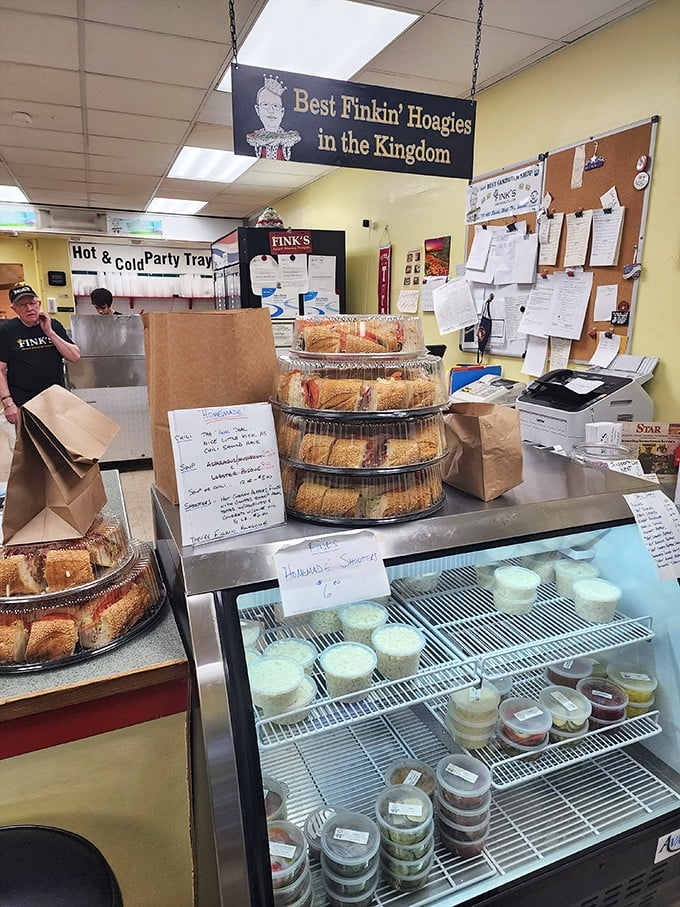 Inside, the "Best Finkin' Hoagies in the Kingdom" sign isn't just clever wordplay—it's a mission statement backed by stacks of freshly made sandwiches awaiting their lucky recipients.