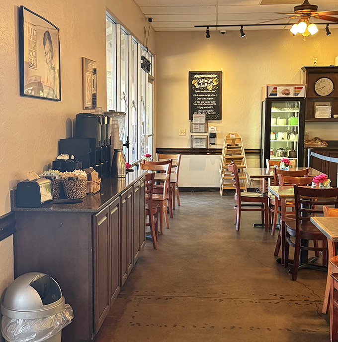 Simple wooden chairs and warm yellow walls create the perfect backdrop for life-changing pastry moments. No distractions, just you and that cinnamon roll.