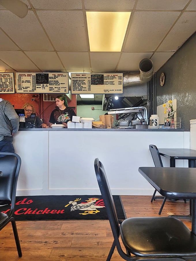 No-frills dining at its finest. The counter staff works their magic while the aroma of perfectly seasoned chicken fills every corner of this humble space.