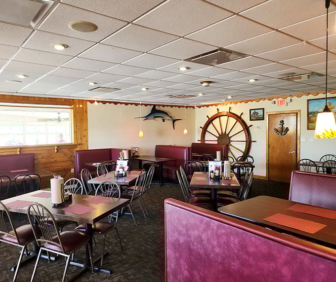 Nautical nostalgia meets comfort in Meding's dining room, where that ship's wheel isn't just decoration—it's steering you toward seafood nirvana.