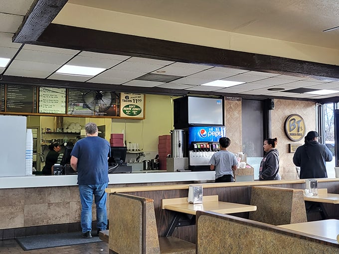 Where the magic happens: The no-nonsense counter where locals line up for their fix of cross-cultural comfort food excellence.