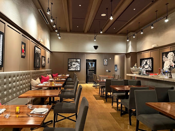 The bistro's interior strikes that perfect Parisian balance—sophisticated enough for a special occasion yet comfortable enough for Tuesday's lunch escape.