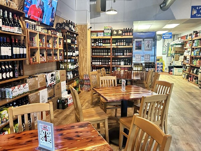 Not just a wine shop – a cozy nook where wooden tables invite you to linger among bottles that whisper stories of distant vineyards.