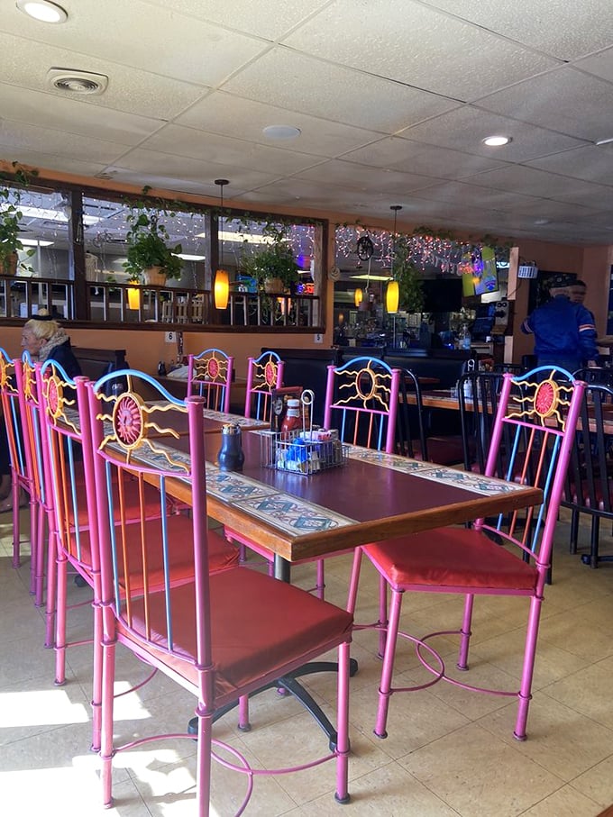 Those pink metal chairs aren't something you see in every diner—they're like the eccentric aunt who brings unexpected joy to family gatherings.