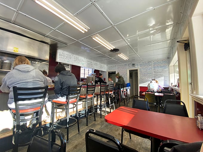 The counter seating offers front-row tickets to the greatest show in town: breakfast theater, complete with sizzling griddles and short-order symphonies.